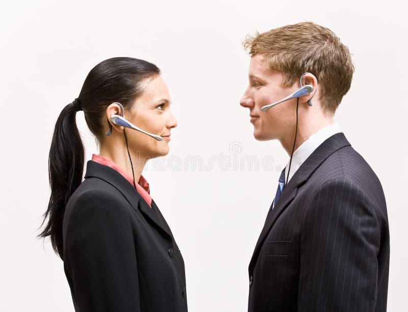 Business People in Headsets Standing Face To Face Stock Photo - Image ...