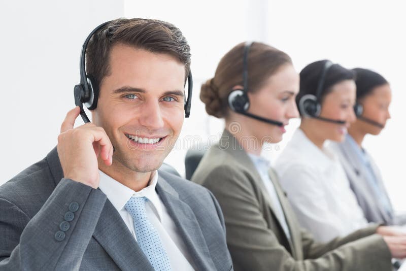 Business People with Headsets Using Computers Stock Photo - Image of ...
