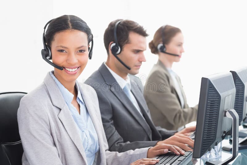 Business People with Headsets Using Computers Stock Image - Image of ...