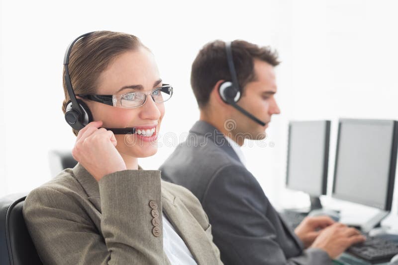 Business People with Headsets Using Computers Stock Image - Image of ...