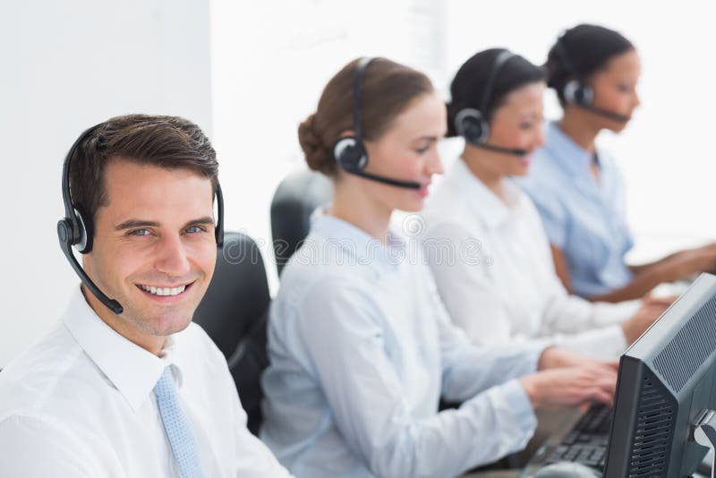 Business People with Headsets Using Computers Stock Photo - Image of ...