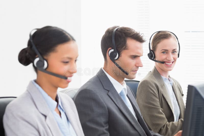 Business People with Headsets Using Computers Stock Photo - Image of ...