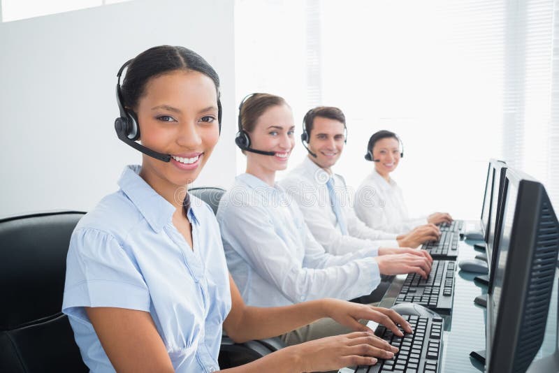 Business People with Headsets Using Computers Stock Image - Image of ...