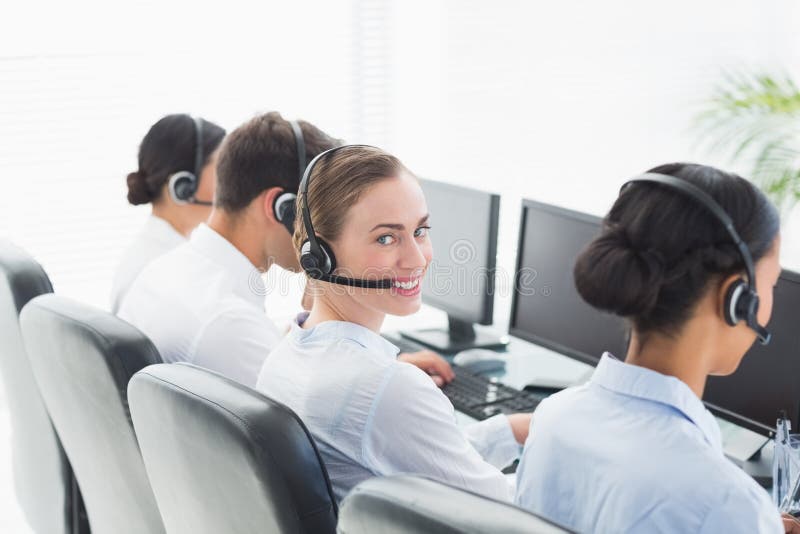 Business People with Headsets Using Computers Stock Image - Image of ...