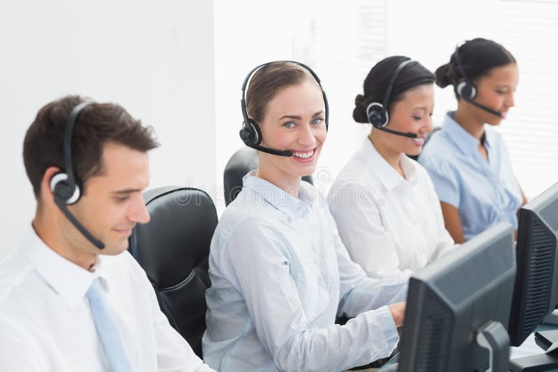 Business People with Headsets Using Computers Stock Photo - Image of ...