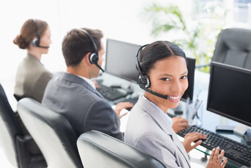 Business People with Headsets Using Computers Stock Image - Image of ...