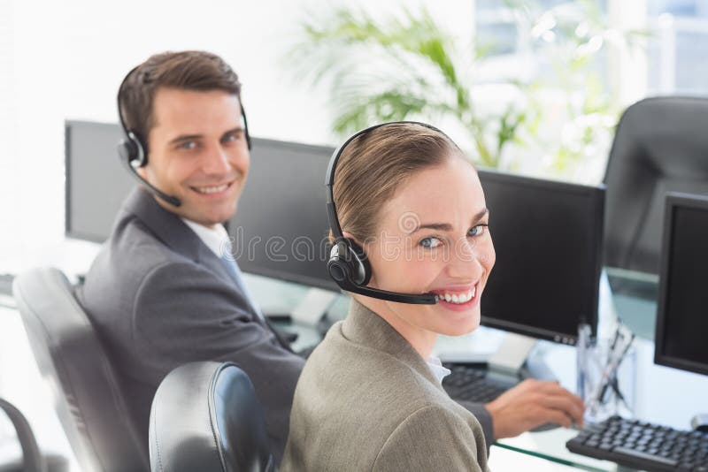 Business People with Headsets Using Computers Stock Photo - Image of ...