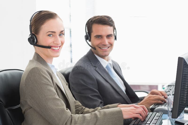 Business People with Headsets Using Computers Stock Photo - Image of ...
