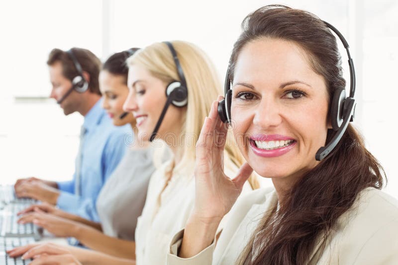 Business People with Headsets Using Computers in Office Stock Photo ...