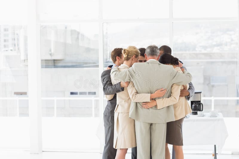 Business People Hugging in a Circle Stock Photo - Image of quarter ...