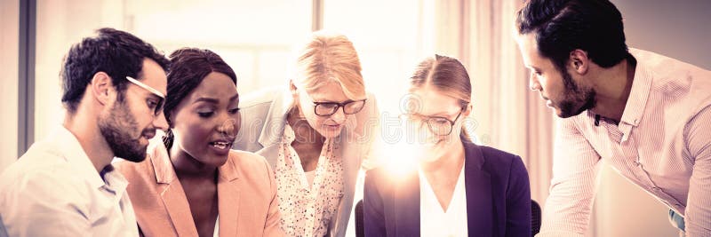 Business People Interacting Using Laptop, Mobile Phone and Digital ... Business People Interacting Using Laptop, Mobile Phone and Digital ...