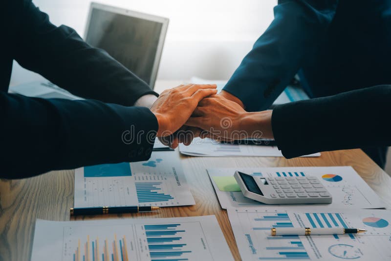 Business People Join Hands To Join Forces As a Teamwork Stock Photo ...