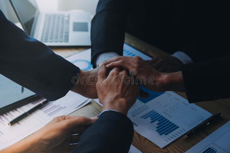 Business People Join Hands To Join Forces As a Teamwork Stock Photo ...