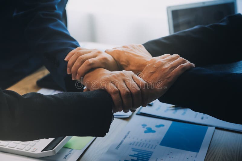 Business People Join Hands To Join Forces As a Teamwork Stock Image ...