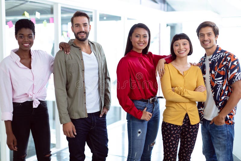 Business People Looking at Camera in a Modern Office Stock Photo ...