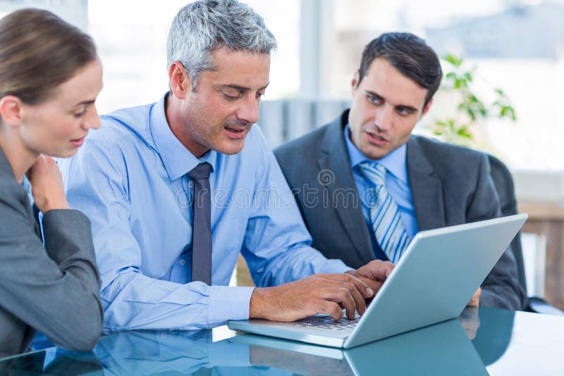 Business People Looking at Laptop Computer Stock Photo - Image of chair ...
