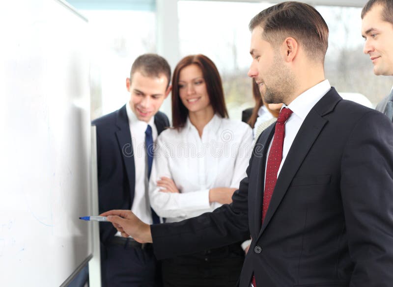 Business People Looking at Their Leader while he Explaining Something ...