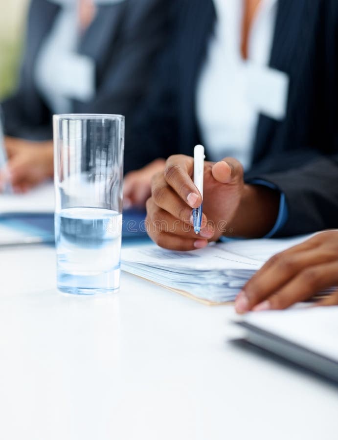 Business People Making a Note by Glass of Water Stock Photo - Image of ...