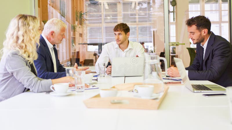 Business People in a Meeting in a Negotiation Stock Photo - Image of ...