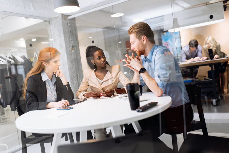 Business People Meeting at Round Table Stock Photo - Image of business ...