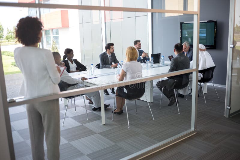 Business people at meeting stock photo. Image of cooperation - 77358972