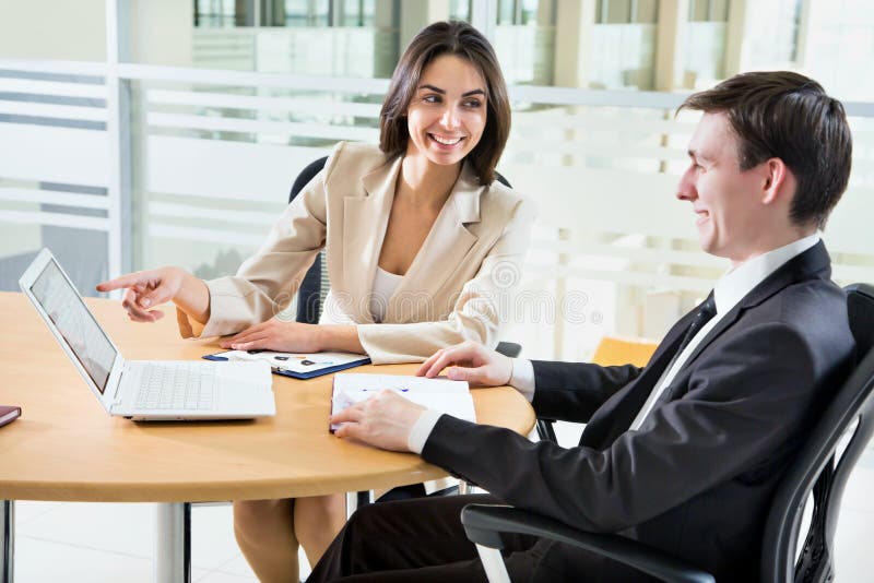 Two Business People on Meeting Analyze Financial Report and Di Stock ...