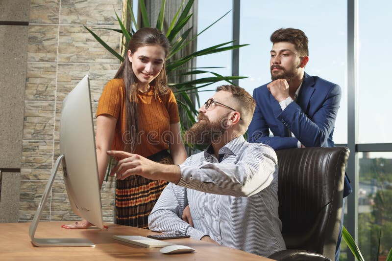 Business People in a Modern Office Discuss Work in Front of the Display ...