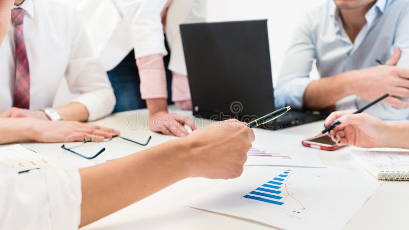 Business People in Office Making Plan and Analyzing Stock Photo - Image ...