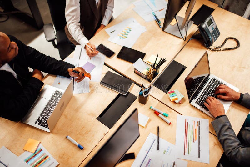 Business People in Office Work Together during a Meeting Stock Image ...