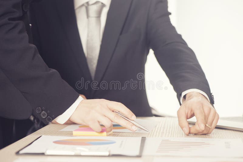 Business People during Paperwork at Meeting Stock Photo - Image of ...