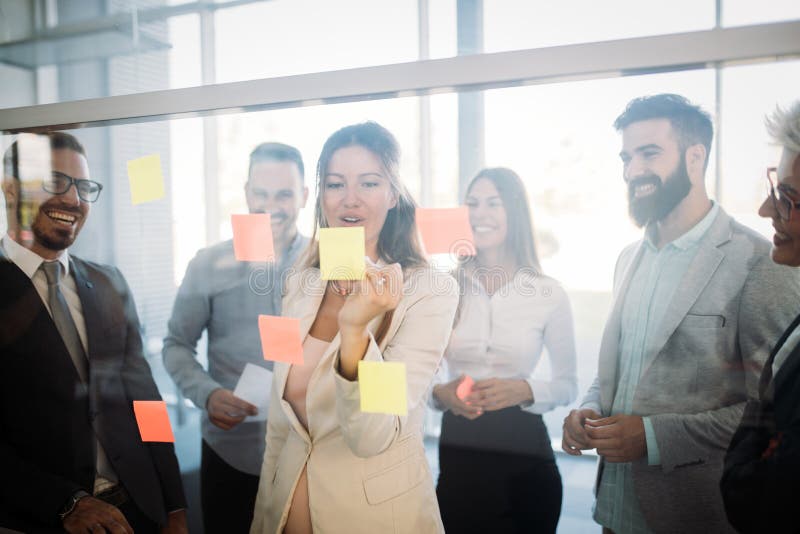 Business People Planning Strategy in Office Together Stock Photo ...