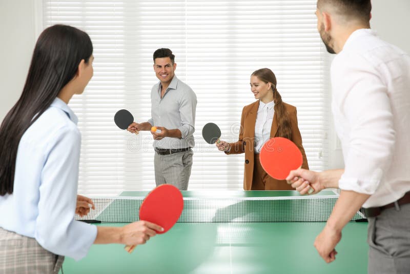 Business People Playing Ping Pong in Office Stock Photo - Image of ...