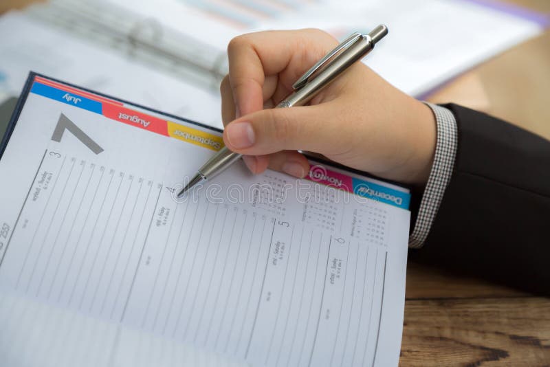 Business People Pointing at Calendar Document Stock Image - Image of ...