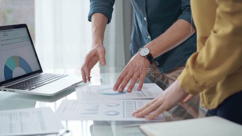 Business People, Professionals Analyzing Financial Charts and Data on a ...