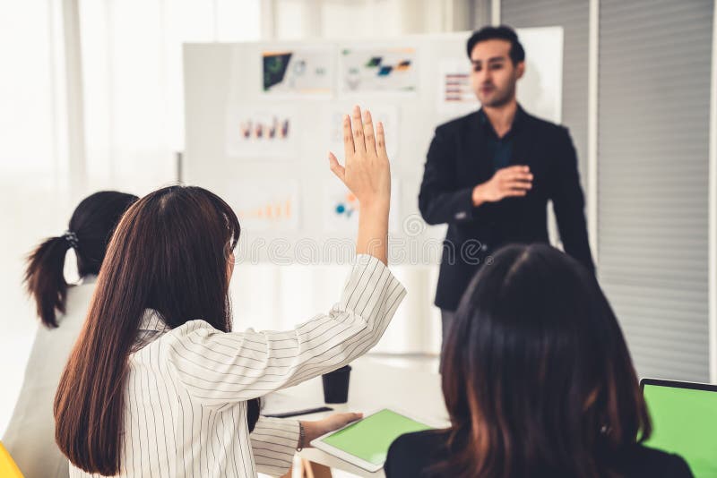 Business People Proficiently Discuss Work Project while Sitting in ...