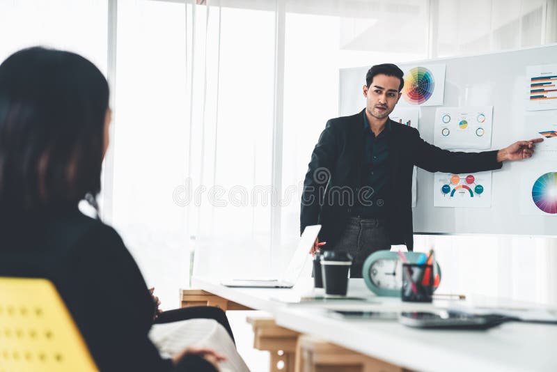 Business People Proficiently Discuss Work Project while Sitting in ...