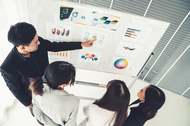 Business People Proficiently Discuss Work Project while Sitting in ...