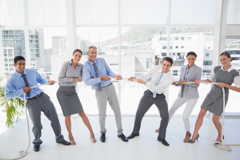 Business People Pulling Rope Stock Image - Image of indoors ...