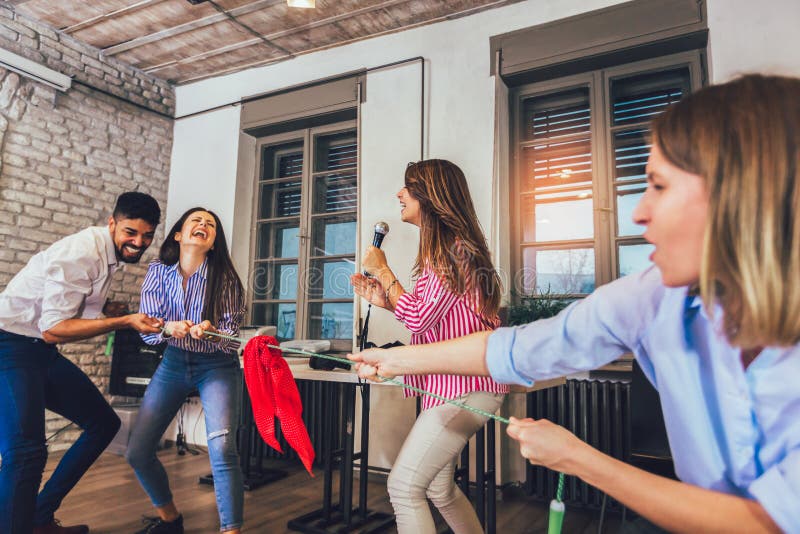 People Pulling Rope in Office, Funny Teambuilding Activity Stock Photo ...