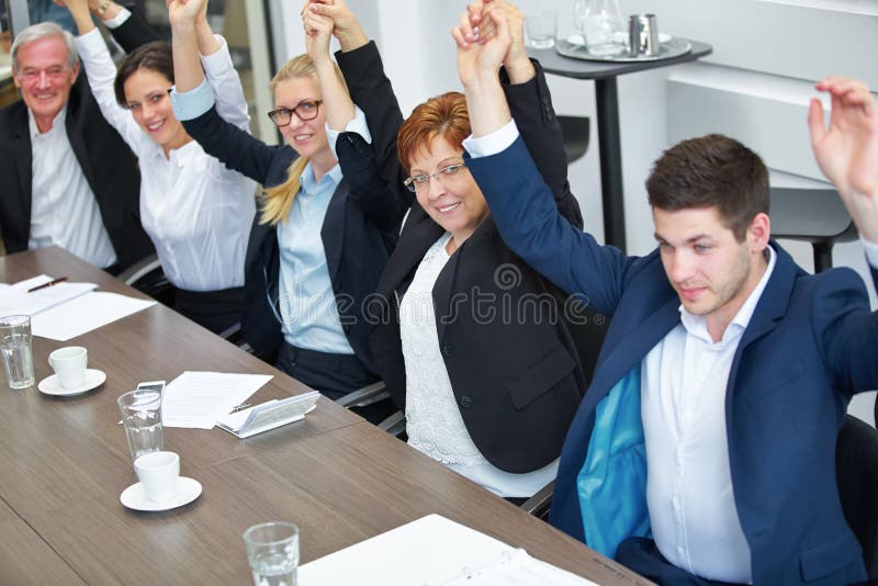 Business People Raise Hands for Motivation Stock Photo - Image of ...