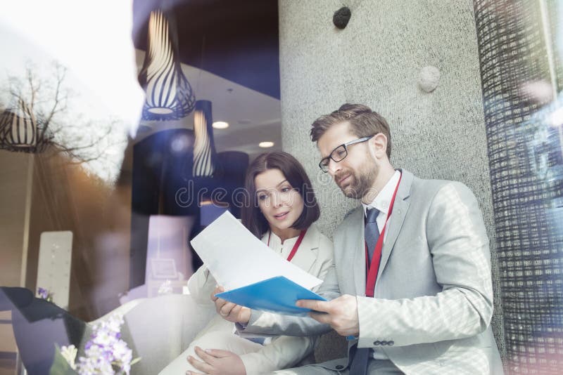 Business People Reading Document Sitting Convention Center Stock Photos ...