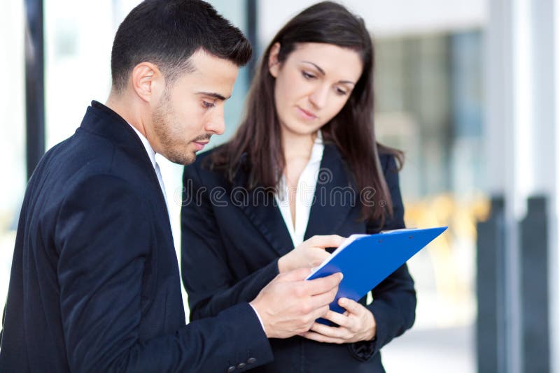Business People Reading Some Documents Stock Image - Image of women ...