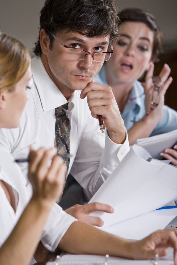 Business People Reviewing Reports Stock Photo - Image of team, business ...