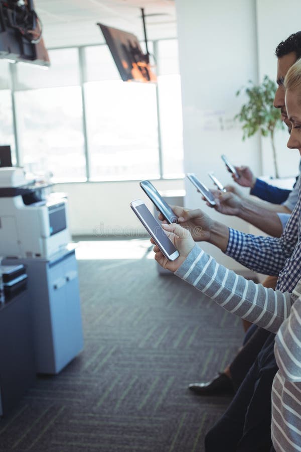 Business People in Row Using Mobile Phones Stock Image - Image of ...
