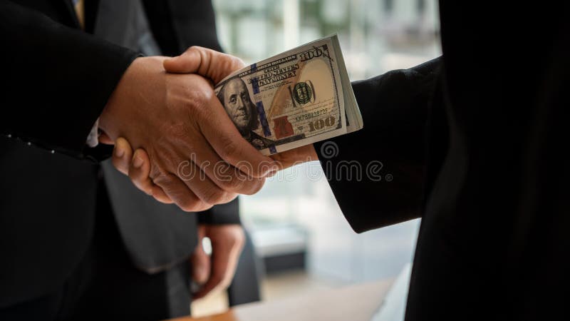 Business People Shake Hands with Money in Hand Stock Photo - Image of ...