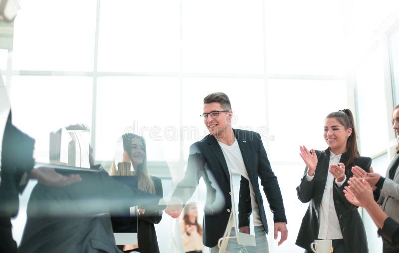 Business People Shake Hands Over an Office Desk. Stock Image - Image of ...