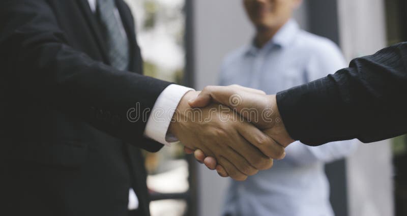 Business People Shake Hands with Business People and Work in the Office ...