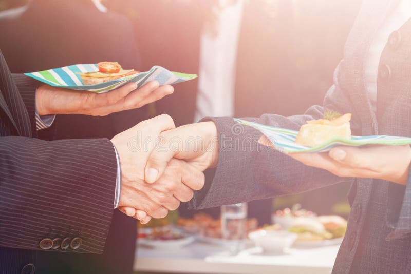 People Shaking Hands after Making Deal during Business Lunch Stock ...