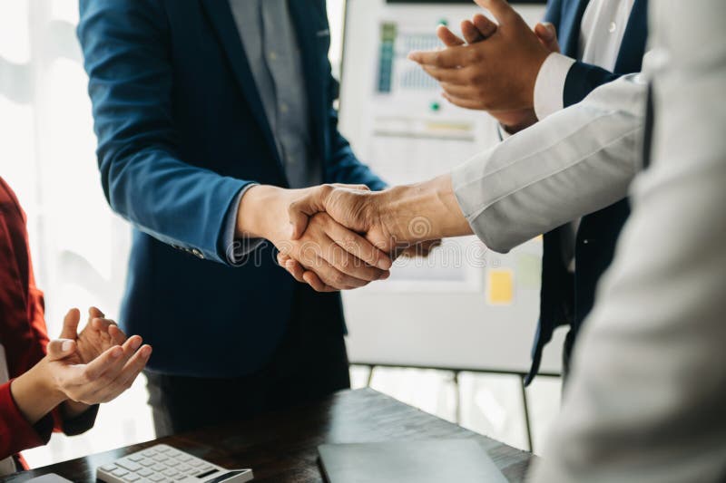 Business People Shaking Hands during a Meeting in Office Stock Image ...
