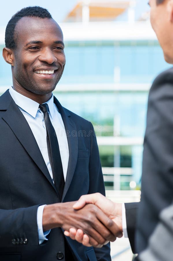Business People Shaking Hands on City Street Stock Image - Image of ...